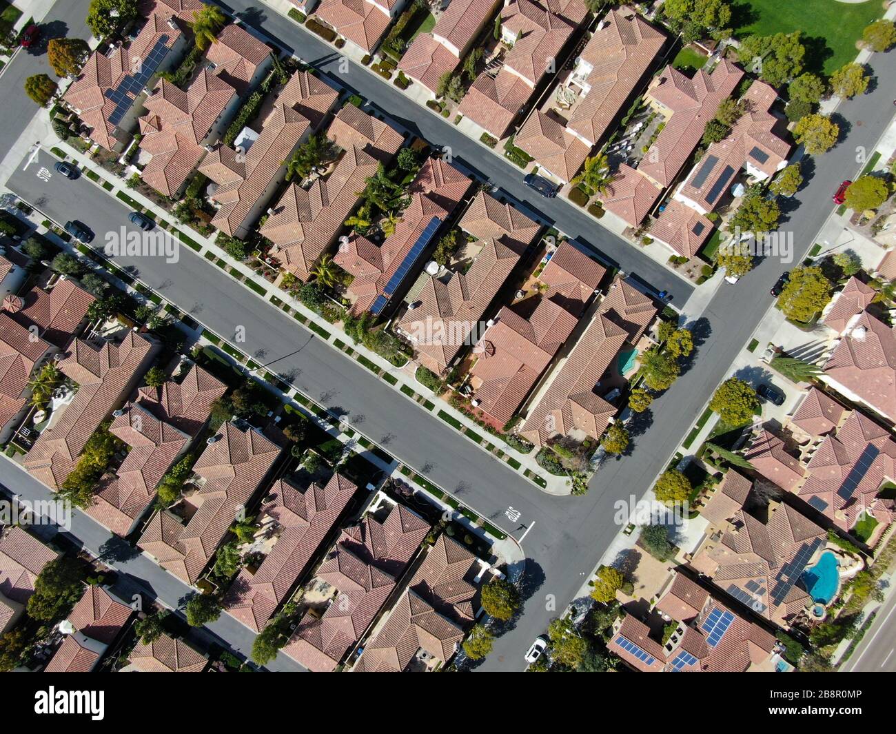 Aerial view suburban neighborhood with identical villas next to each ...