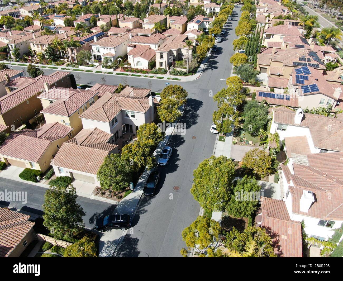 Aerial view suburban neighborhood with identical villas next to each ...
