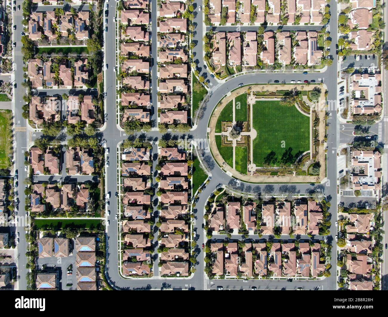 Aerial top view suburban neighborhood with identical villas next to ...