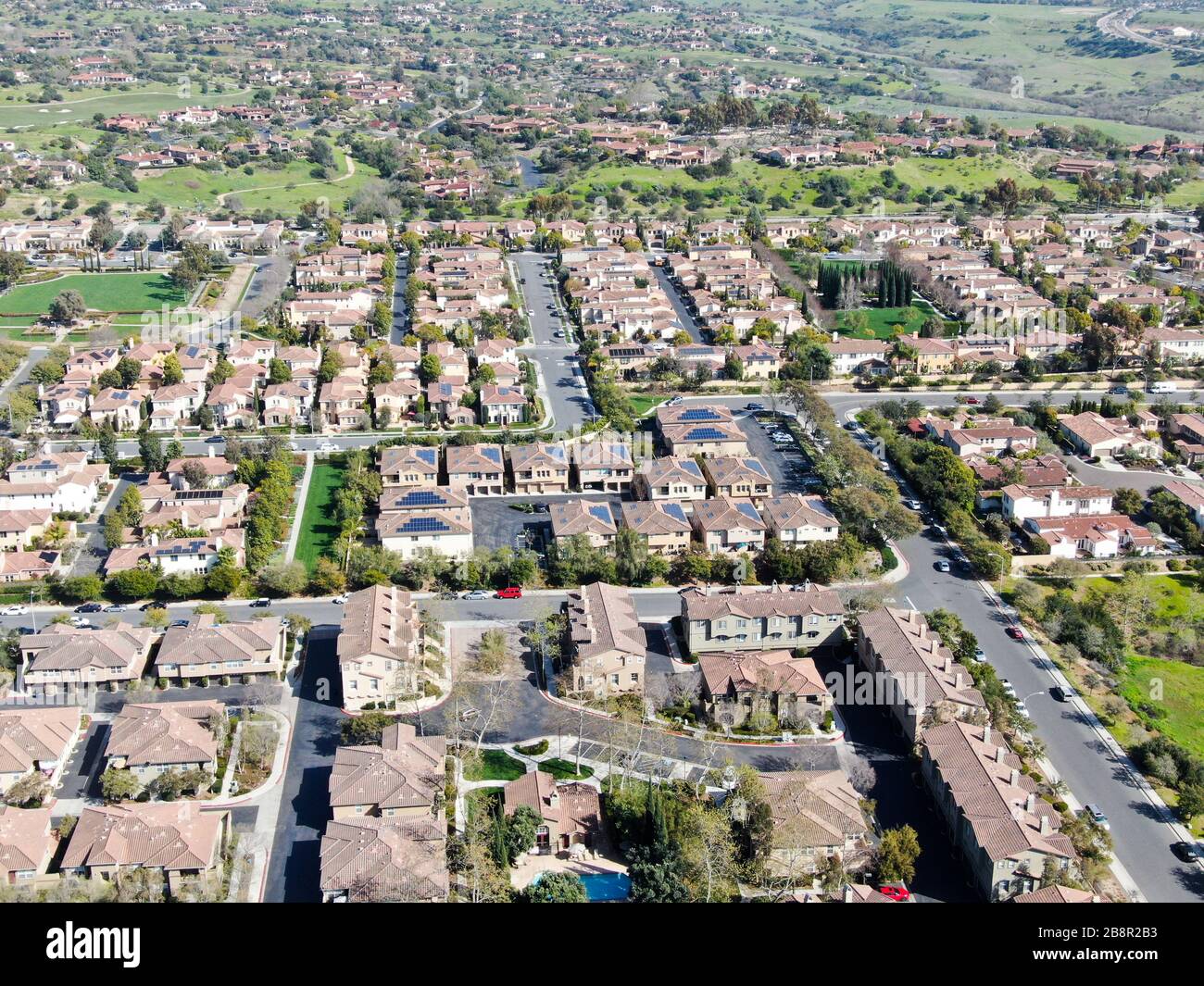 Aerial view suburban neighborhood with identical villas next to each ...