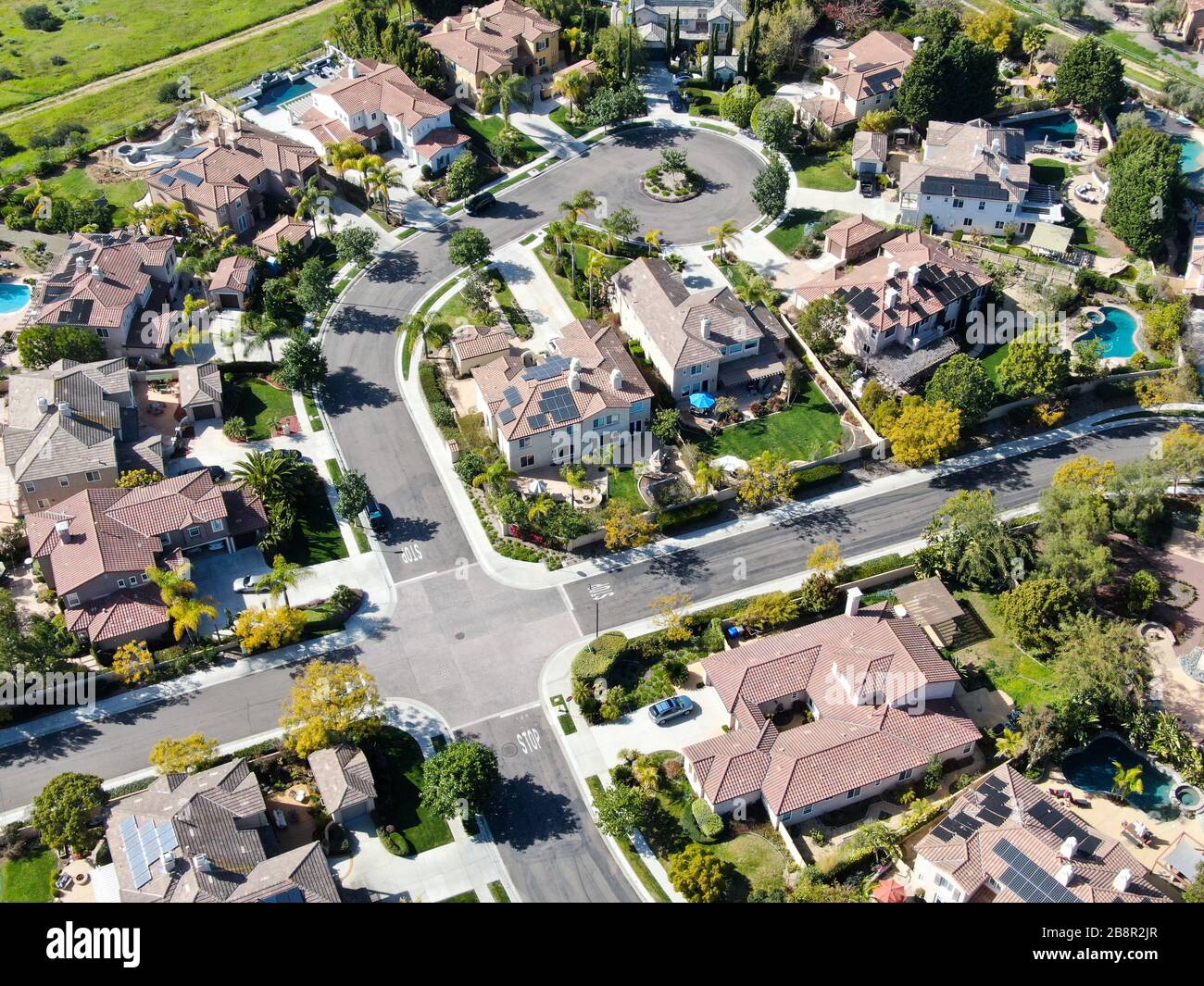 Aerial view suburban neighborhood with identical villas next to each ...