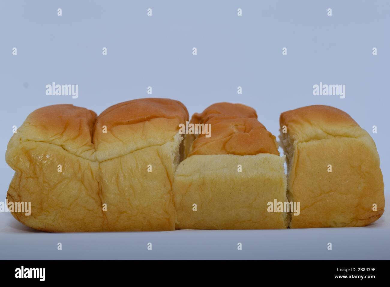 Close up round bread sliced isolated on white background Stock Photo ...