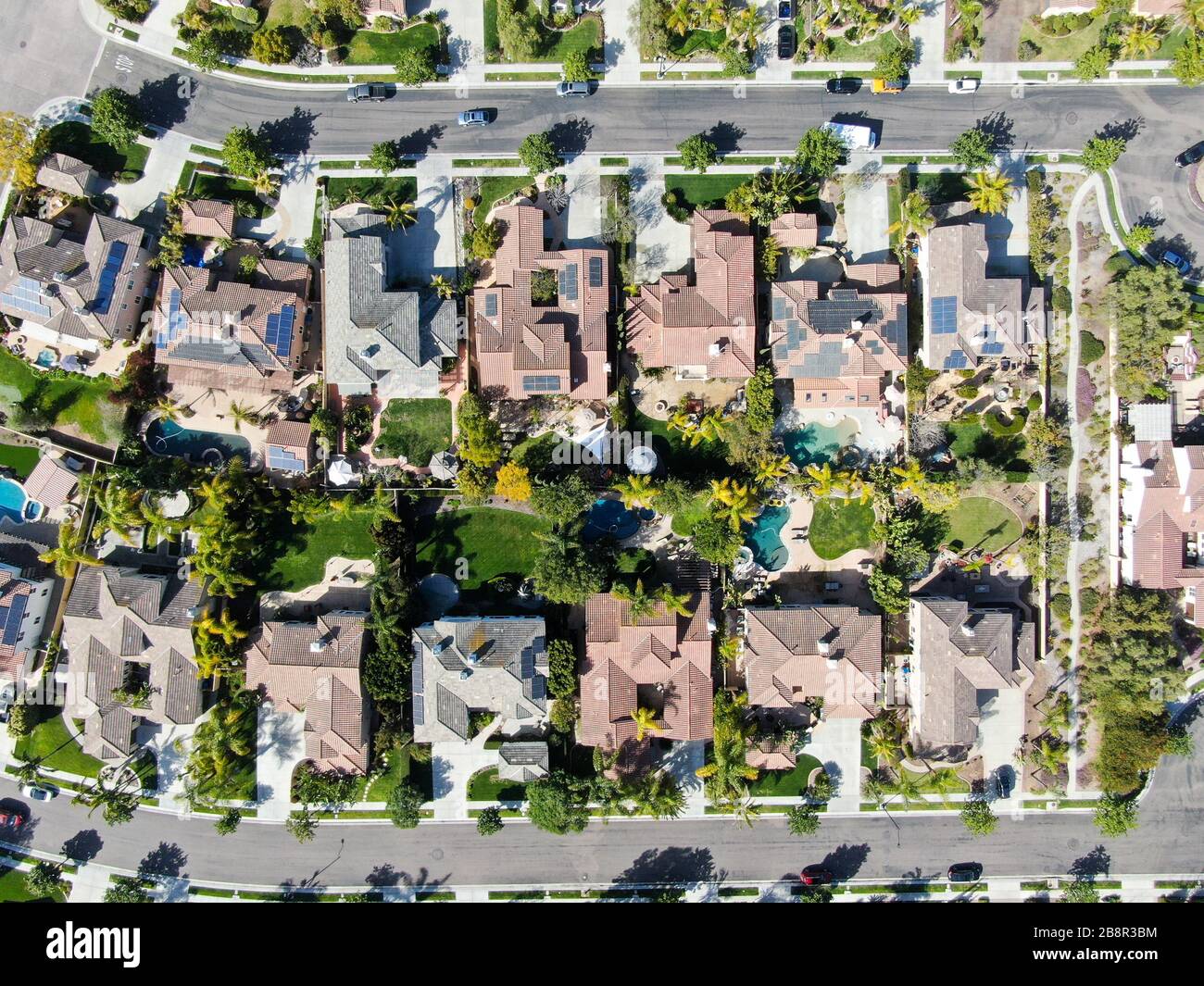 Aerial view suburban neighborhood with identical villas next to each ...
