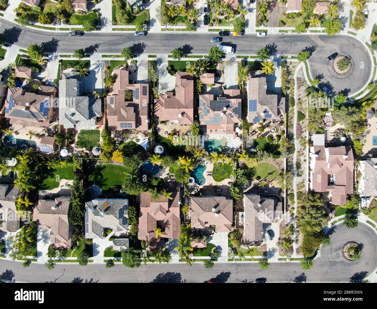 Aerial view suburban neighborhood with identical villas next to each ...