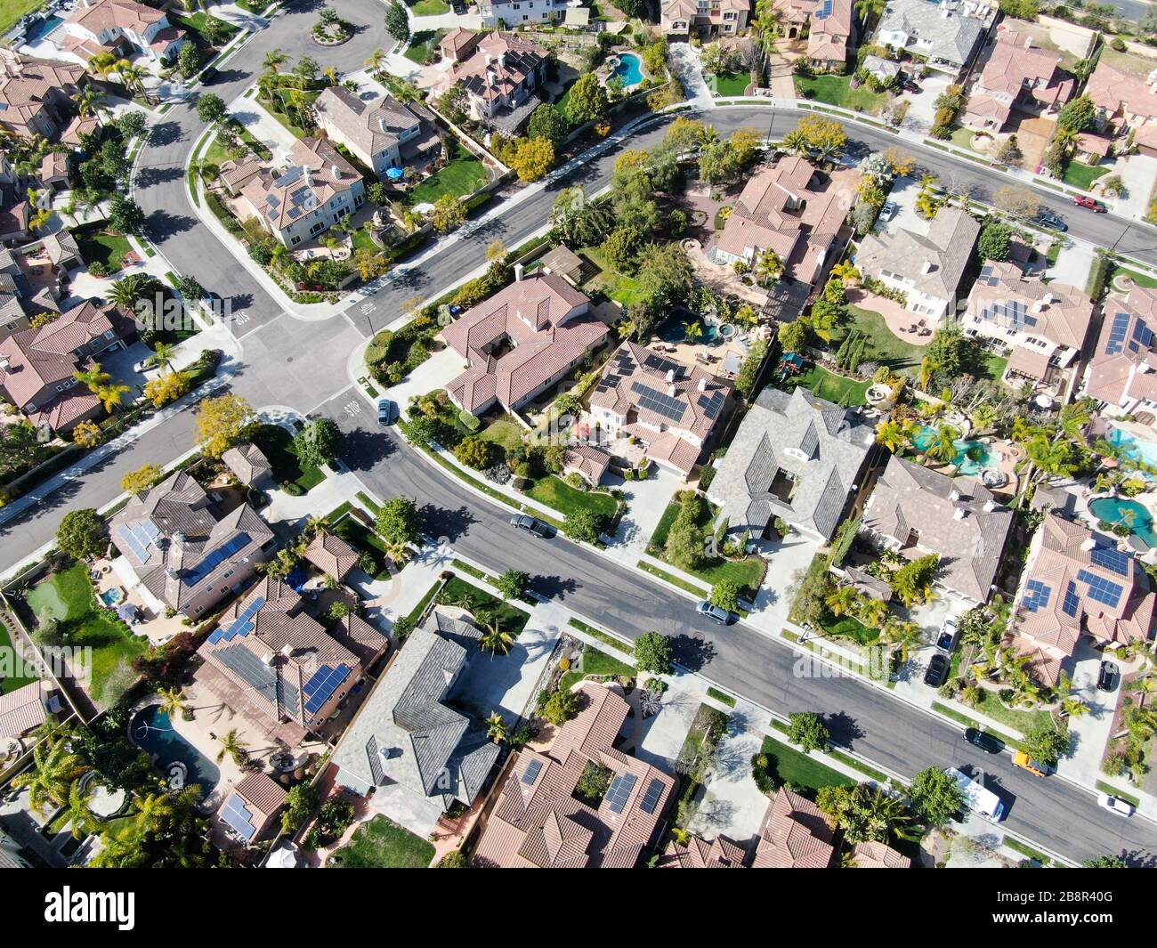 Aerial view suburban neighborhood with identical villas next to each ...