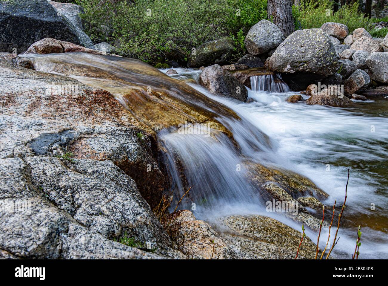 Water rushing over river rocks hi-res stock photography and images - Alamy