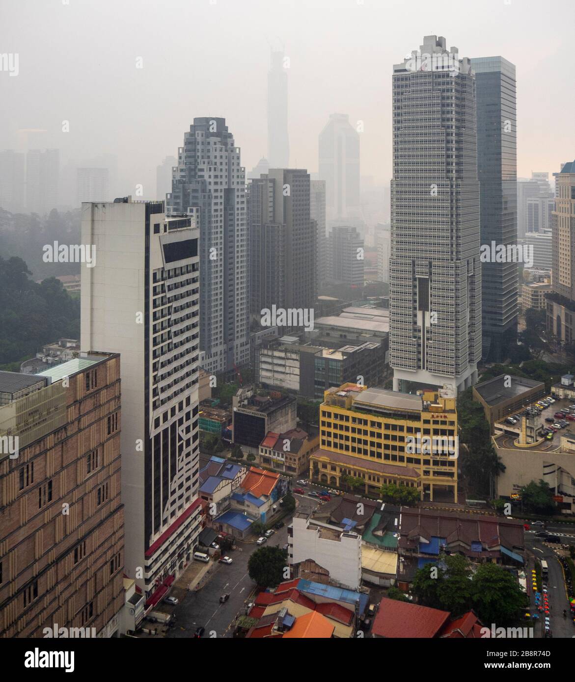 High rise residential hotel and office towers towers on a misty day in ...