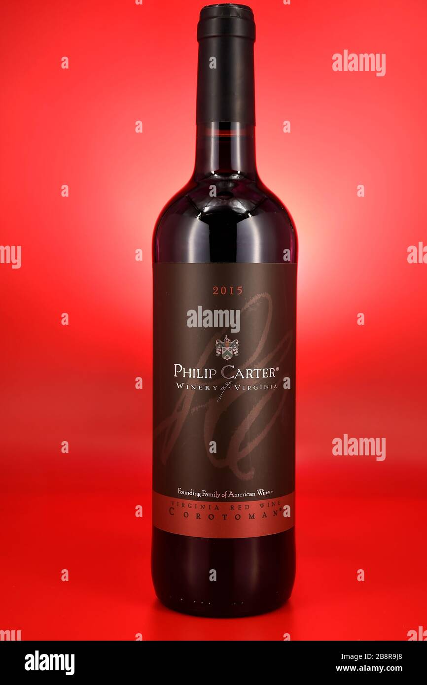 studio vertical shot uncorked bottle of Philip Carter Red Wine ...