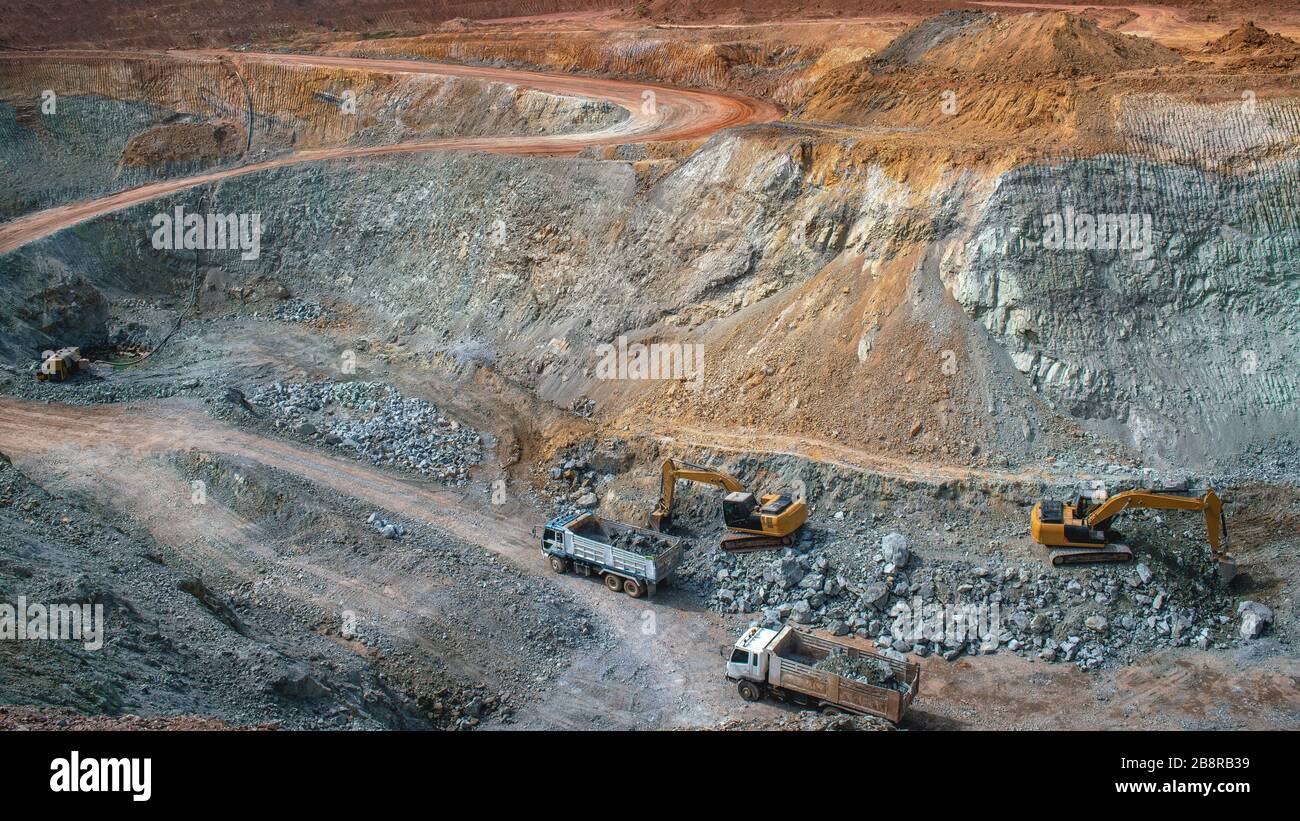 Aerial view of the gold mining openings by the work of many machines ...