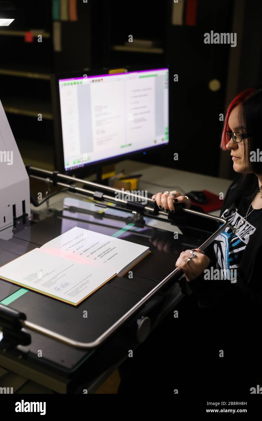 Book libraries scanning hi-res stock photography and images - Alamy