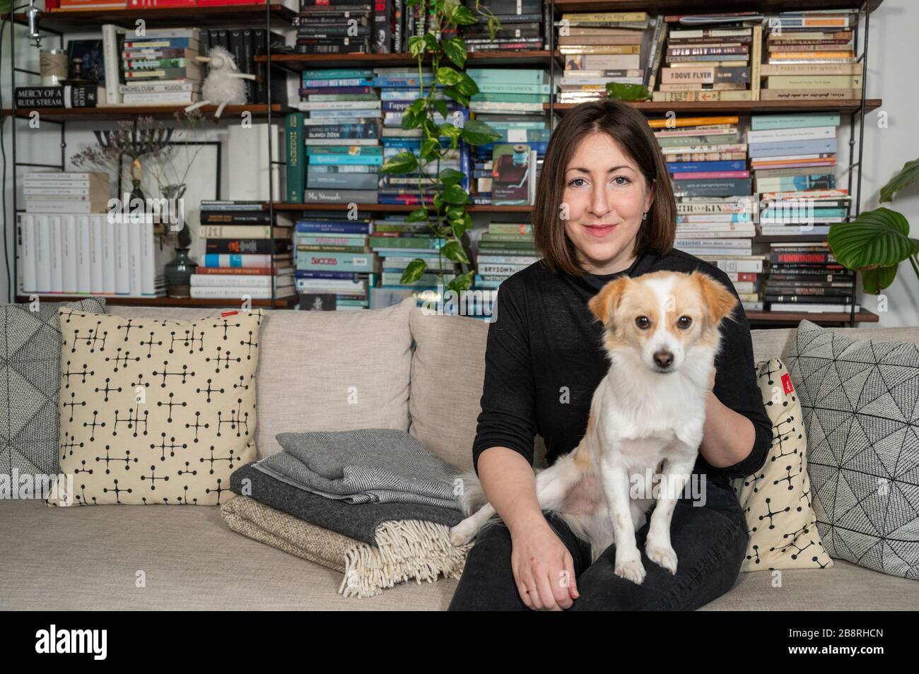 Berlin, Germany. 10th Mar, 2020. Deborah Feldman, writer, sitting at ...