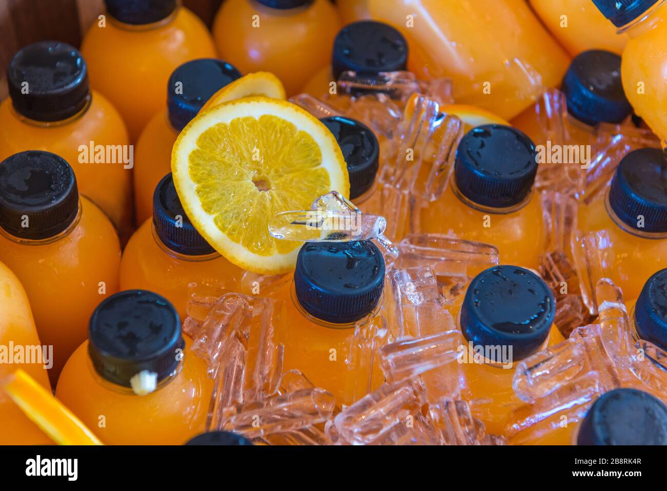 orange juice bottle ice cold in the icebox Stock Photo - Alamy