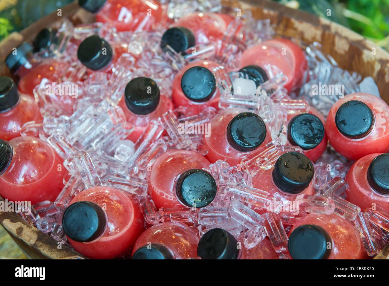Strawberry juice bottle ice cold in the icebox Stock Photo - Alamy