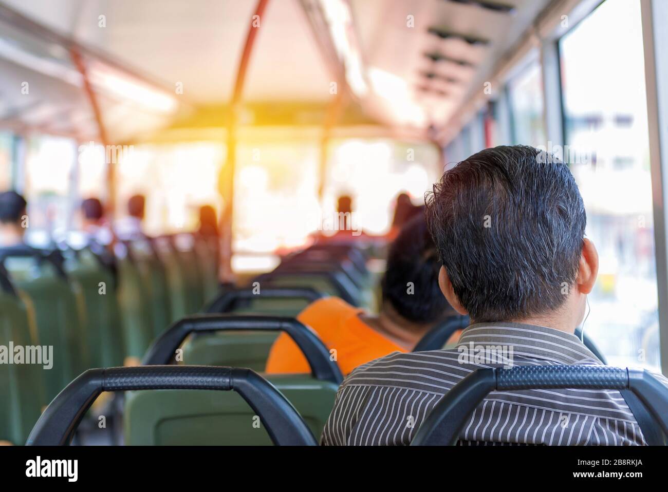 Seat places in back side of modern bus Stock Photo - Alamy