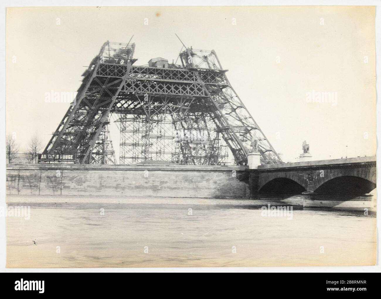 The Eiffel Tower under construction. (Bridge the right). View of the ...