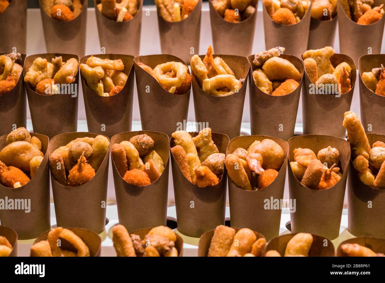 Fried fish and seafood cocktail at the farmers market stall Stock Photo ...