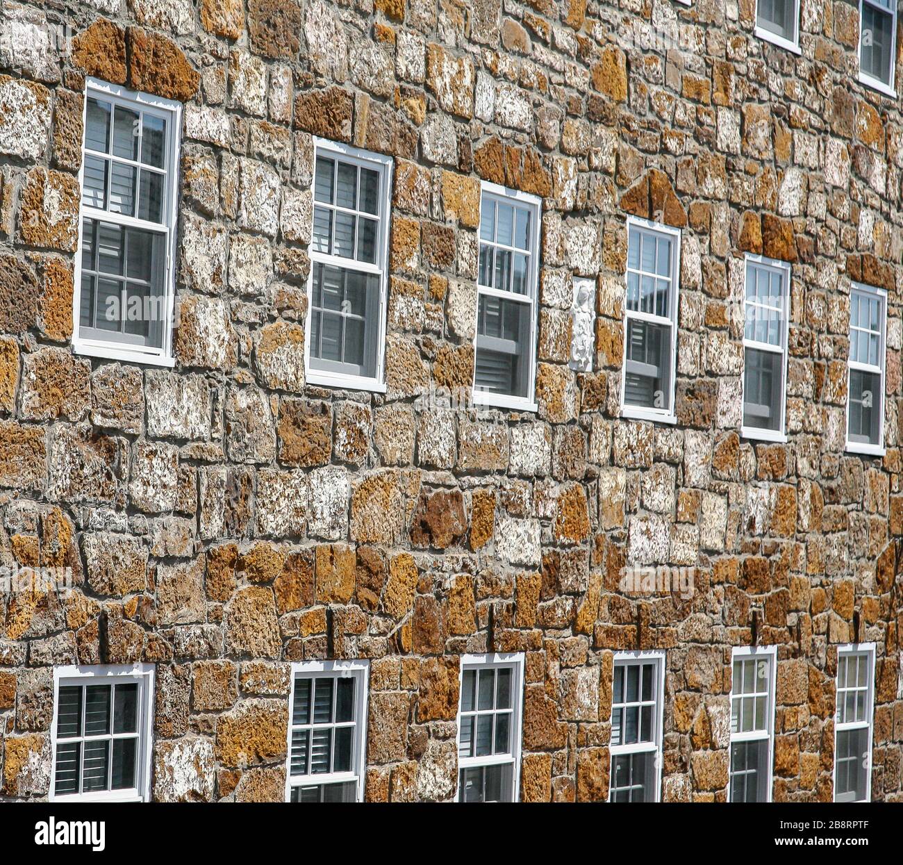 Sandstone building and windows Stock Photo - Alamy