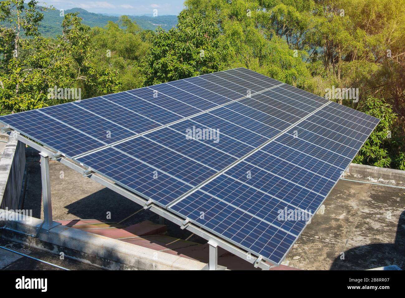 photovoltaic using renewable solar energy in forest Stock Photo - Alamy