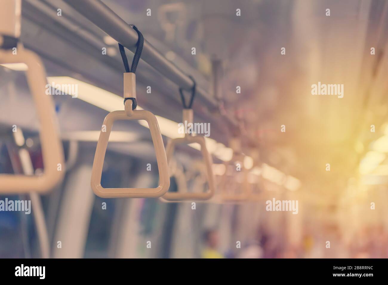 Handles standing passenger inside bus transportation hi-res stock ...