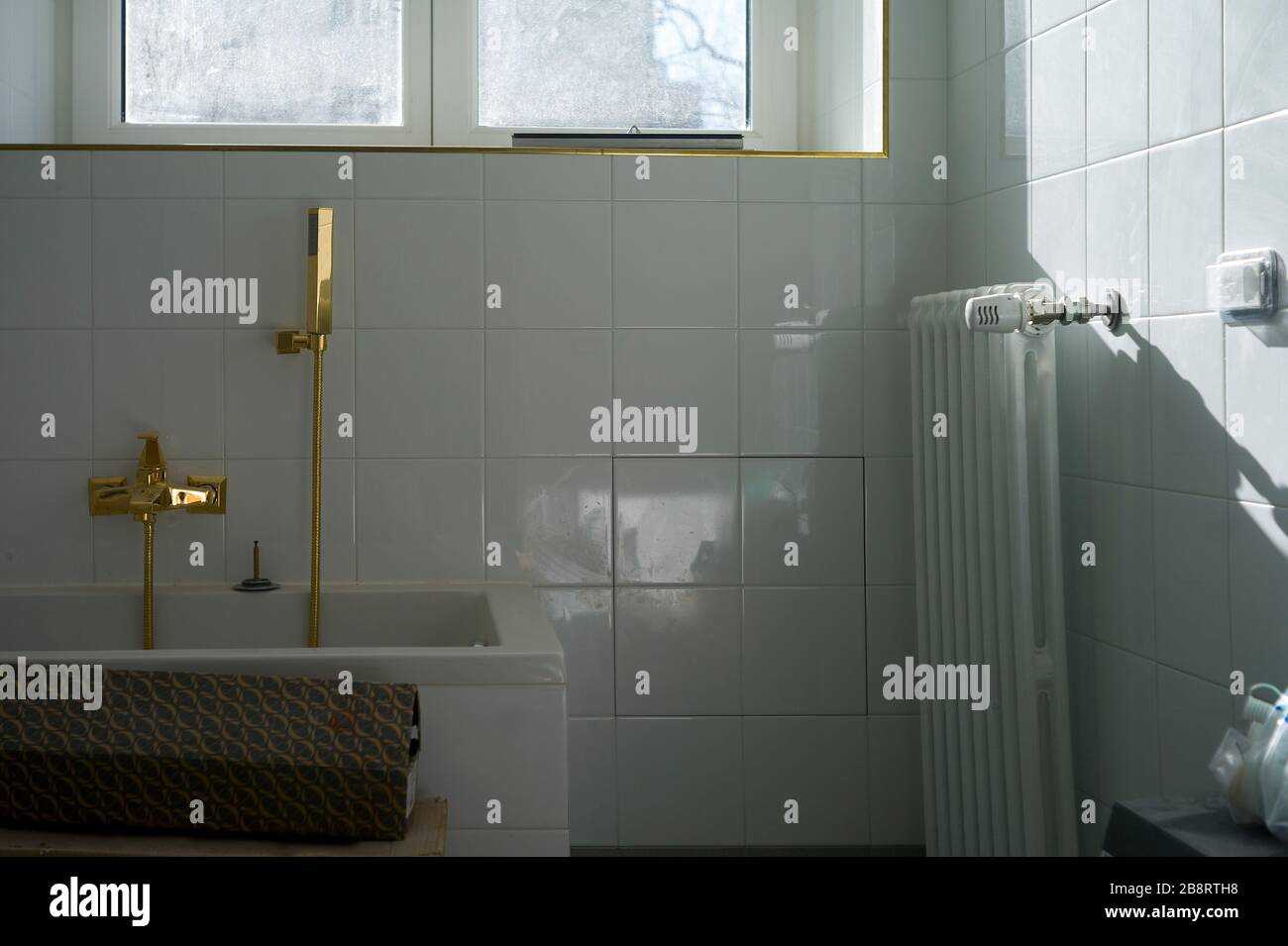Nearly finished renovation in a modern bathroom, indoor contra light ...