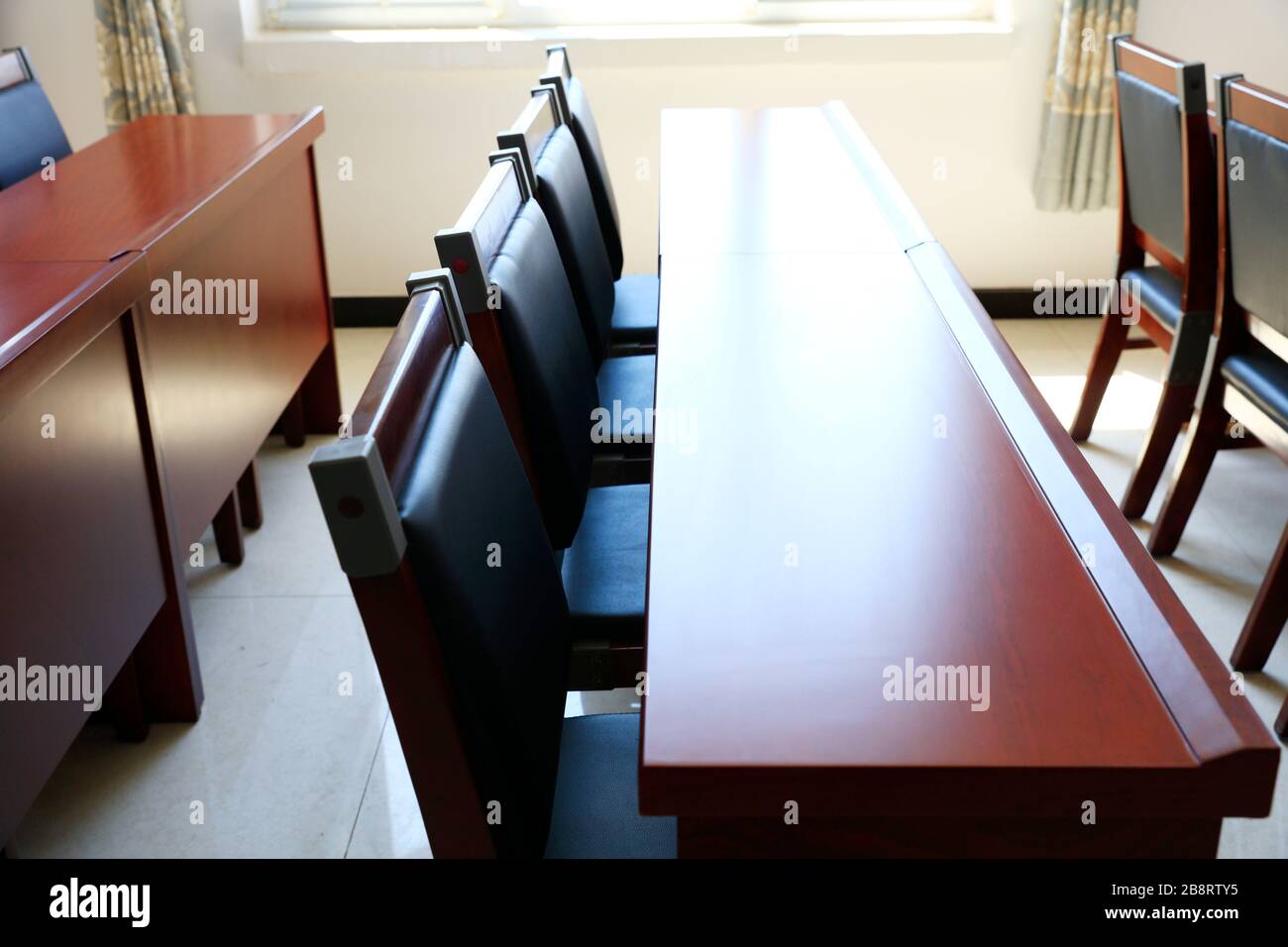 Tables and chairs in the conference room, close-up Stock Photo - Alamy