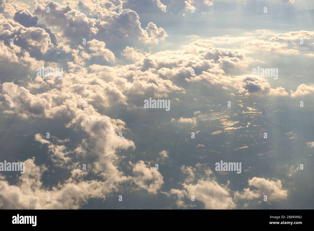 Blue sky and Clouds as seen through window of aircraft Stock Photo - Alamy