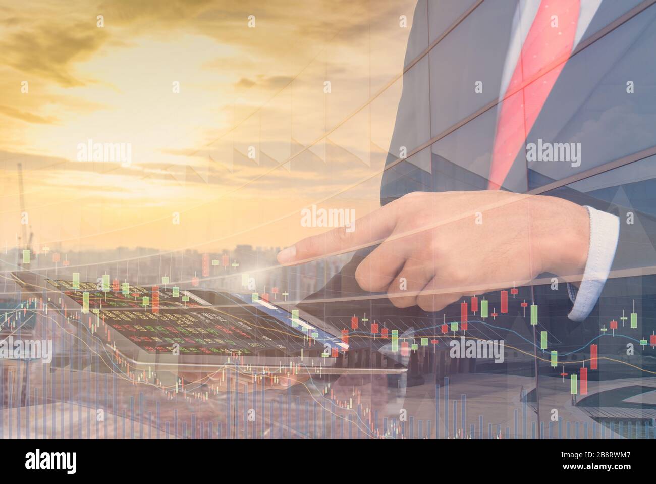 business man Trading concept using the tablet with financial graph on ...