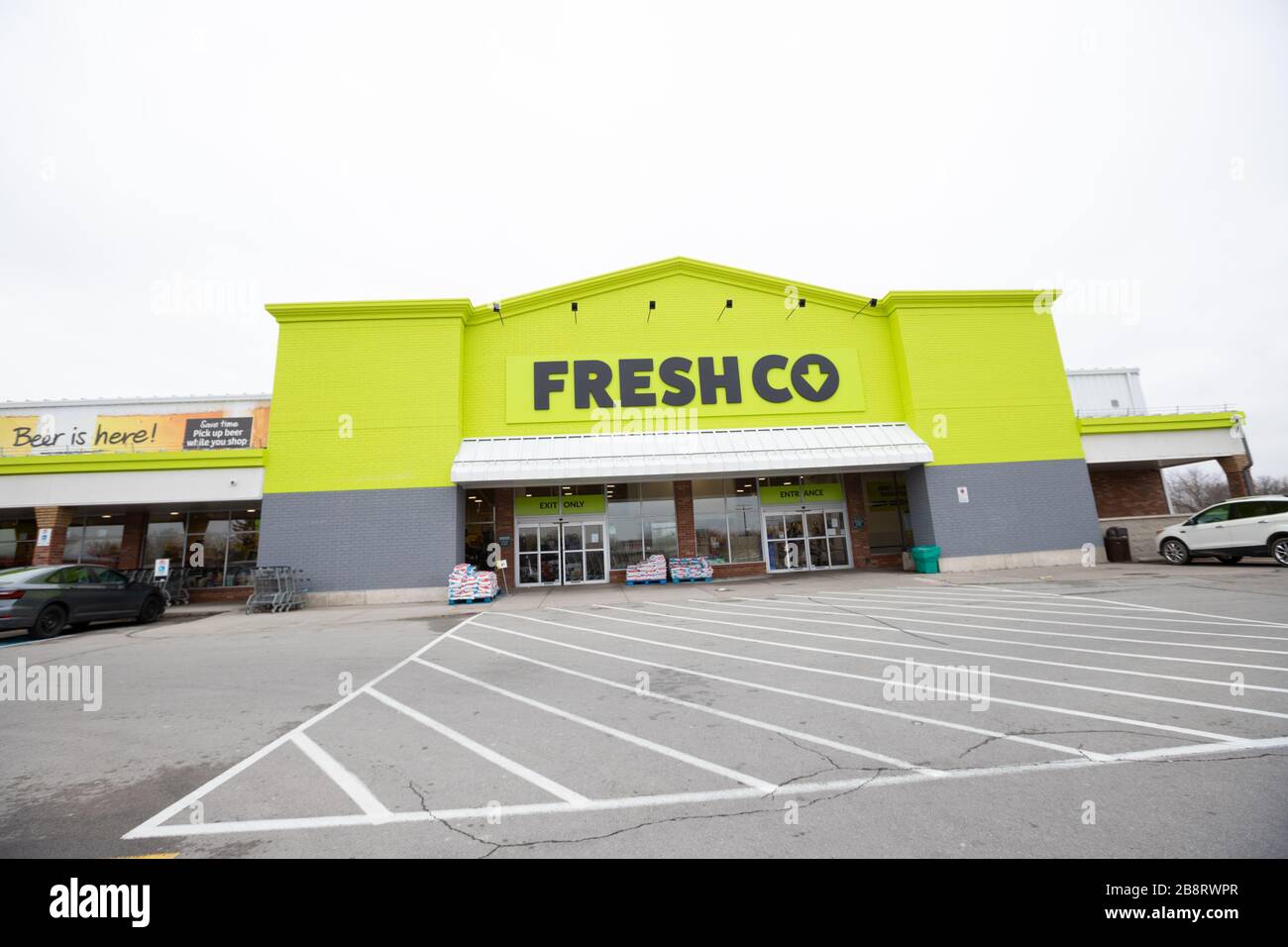 An empty entrance to FreshCo grocery store. Shoppers staying home ...