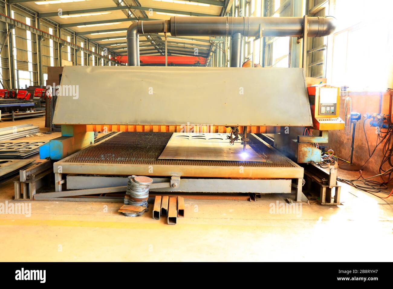 plasma torches cutting machine in mechanical shop Stock Photo - Alamy