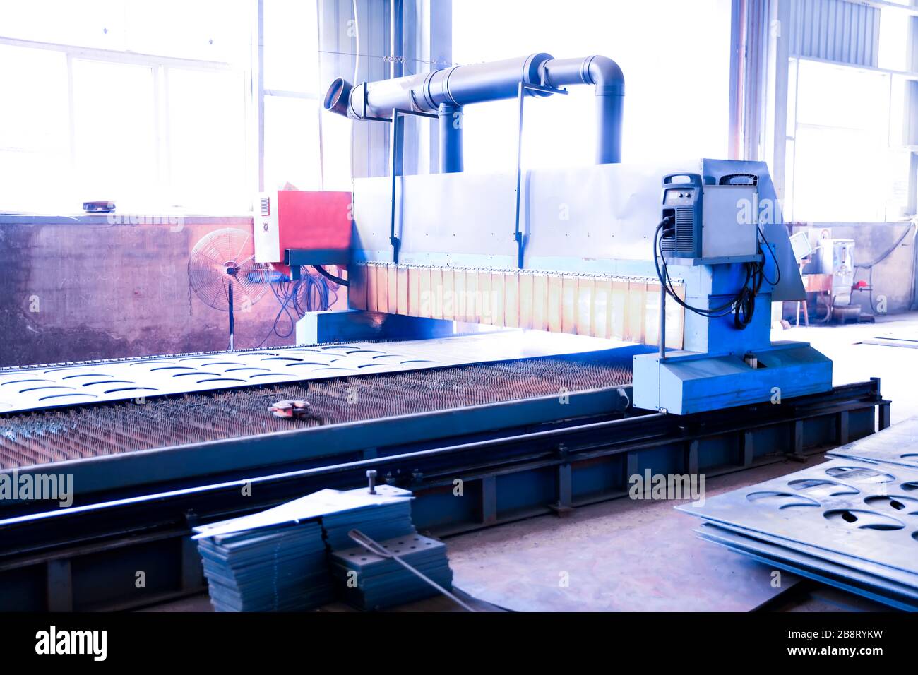 plasma torches cutting machine in mechanical shop Stock Photo - Alamy