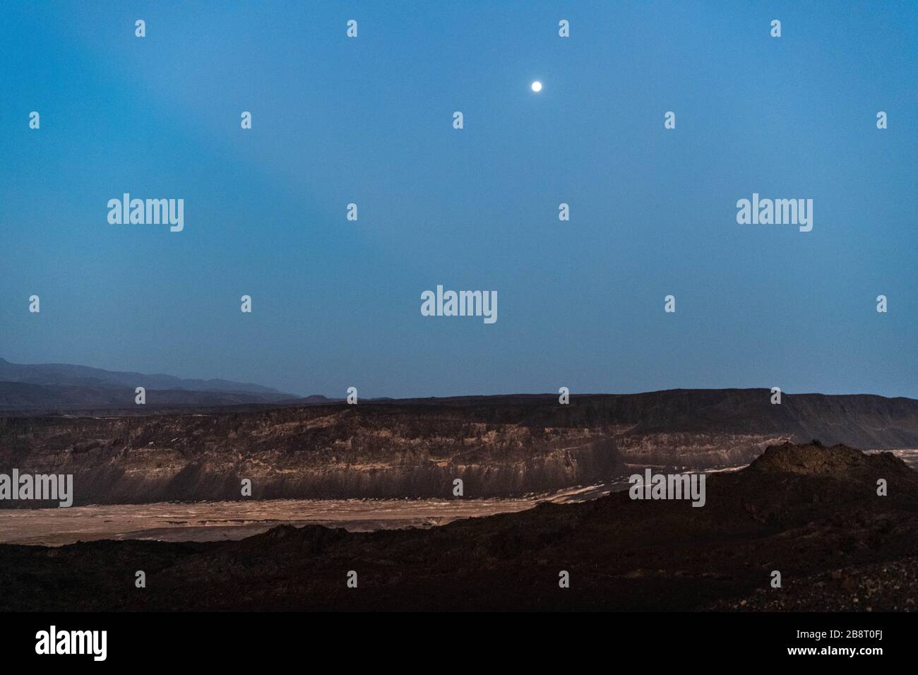 Africa, Djibouti, Ardoukoba. Landscape of Ardoukoba volcano under moon ...