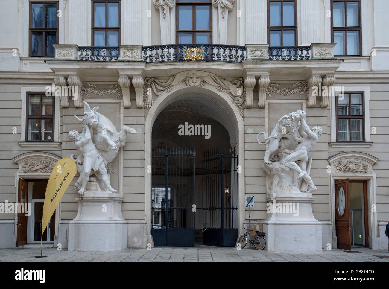 Vienna, Austria. Baroque statues on the entrance gate of St. Michael's ...