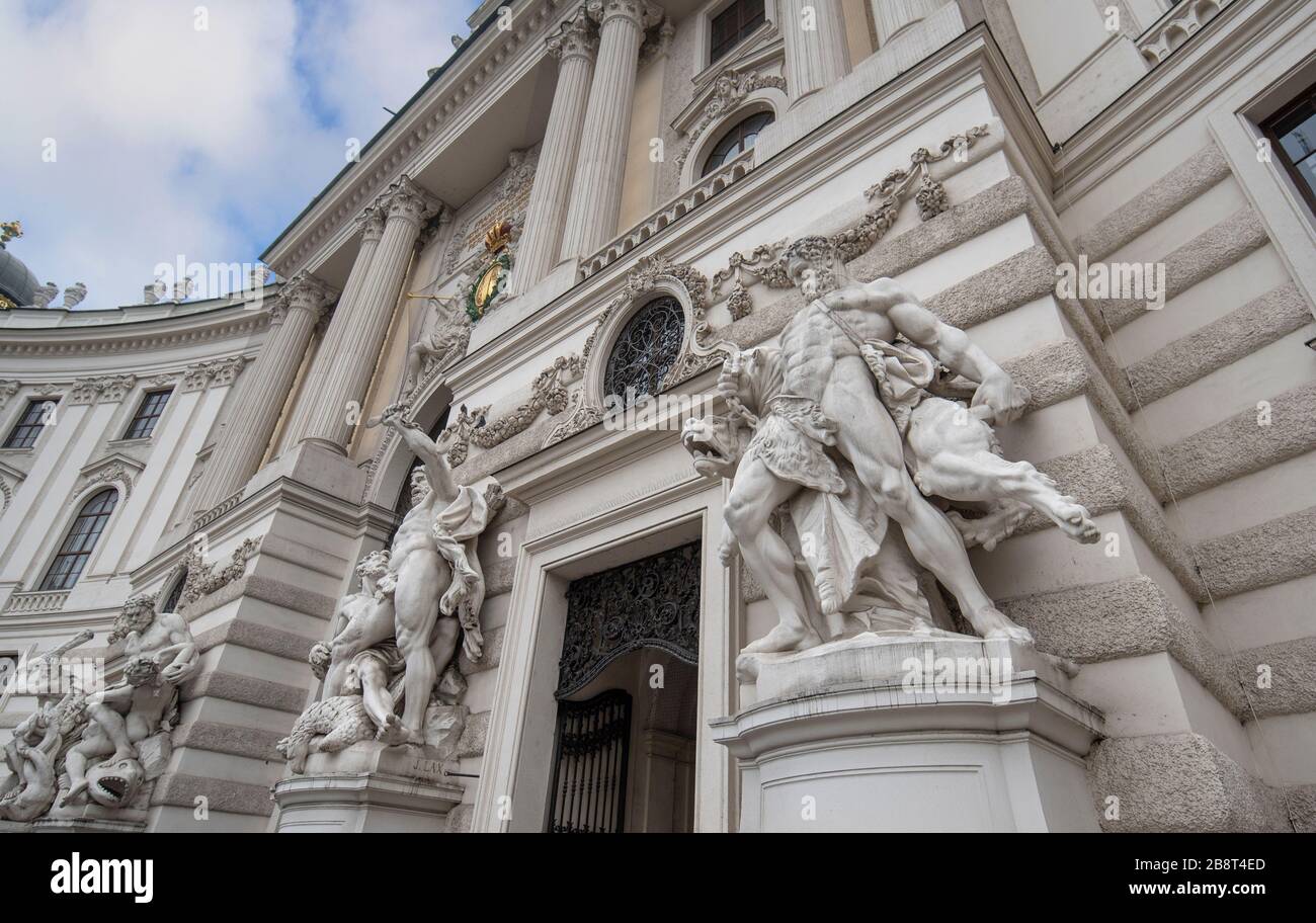 Vienna, Austria. Baroque statues on the entrance gate of St. Michael's ...