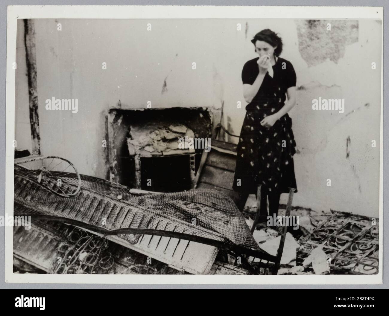Mrs. Henry Max, whose husband and son were executed in the rubble of ...