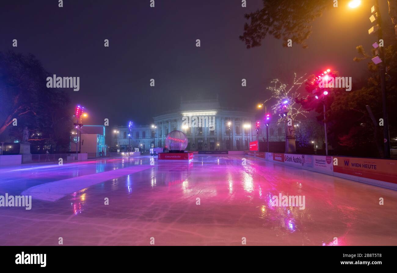VIENNA, AUSTRIA. The Wiener Eistraum or ice rink at night. Front of the ...