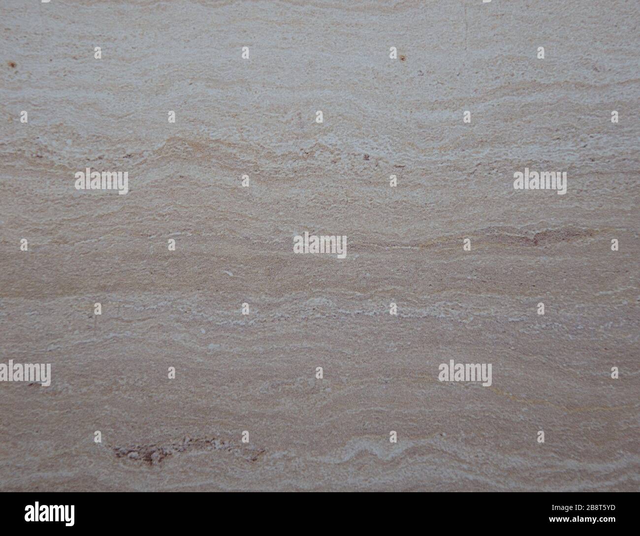 Dirty beige granite with a wavy pattern, polished surface of natural ...