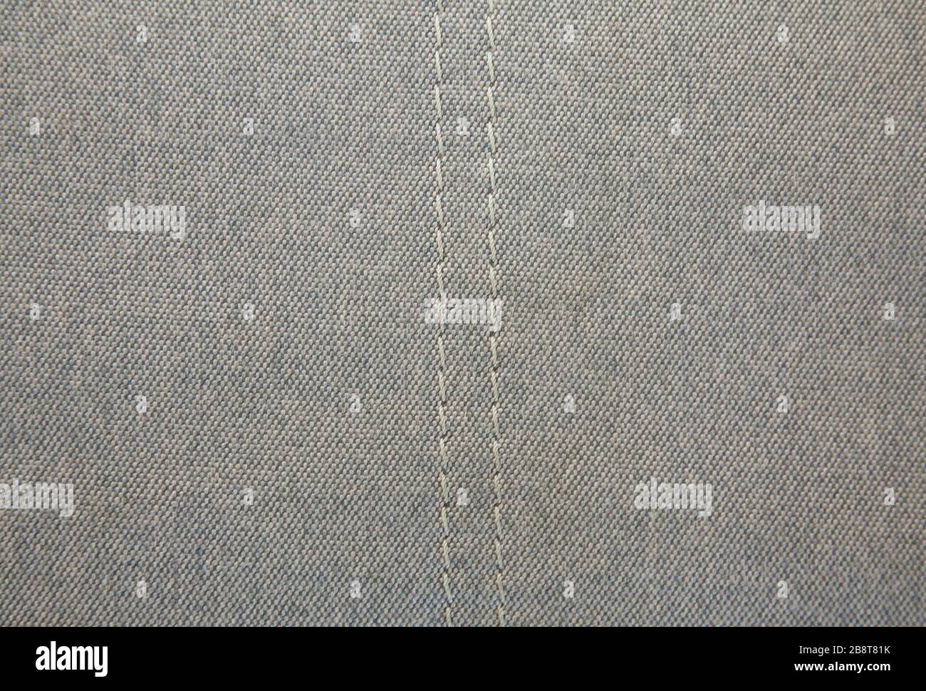Grey textile fabric background closeup Stock Photo - Alamy