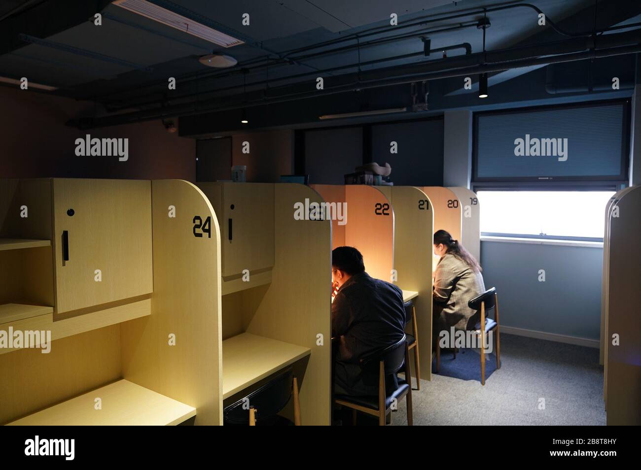 Shanghai, China. 22nd Mar, 2020. People study at a study room in ...
