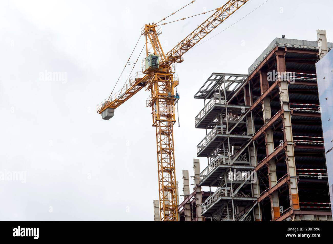 Construction of the frame of high-rise buildings against the overcast ...