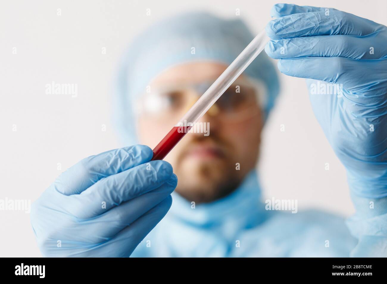 Close up of doctor hand holding blood sample. Medical equipment. Blood ...