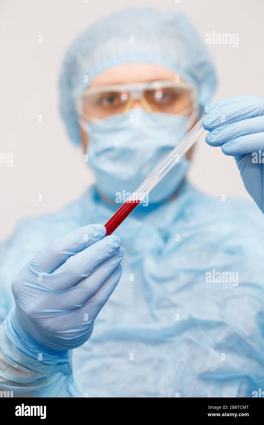 Close up of doctor hand holding blood sample. Medical equipment. Blood ...