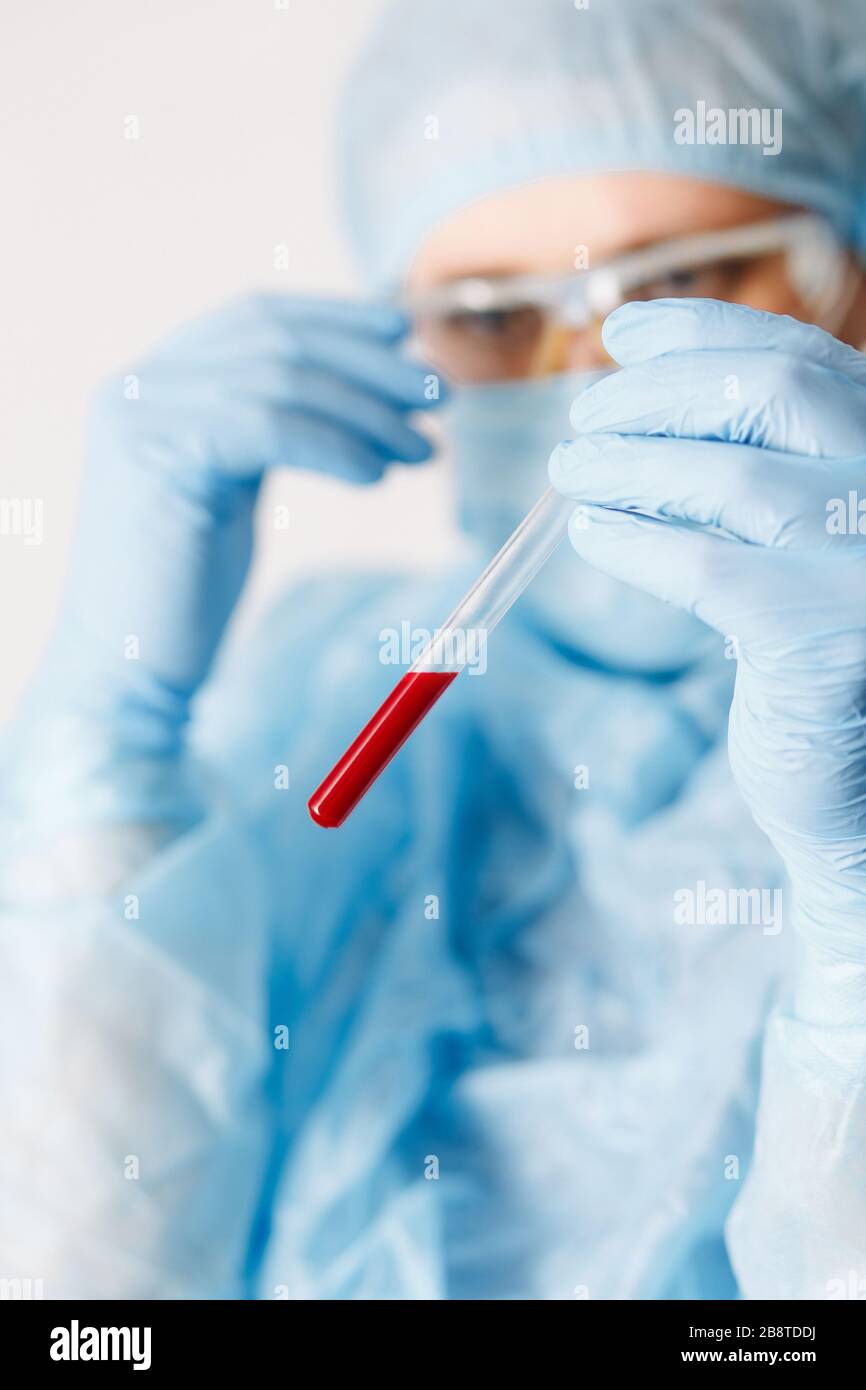 Close up of doctor hand holding blood sample. Medical equipment. Blood ...
