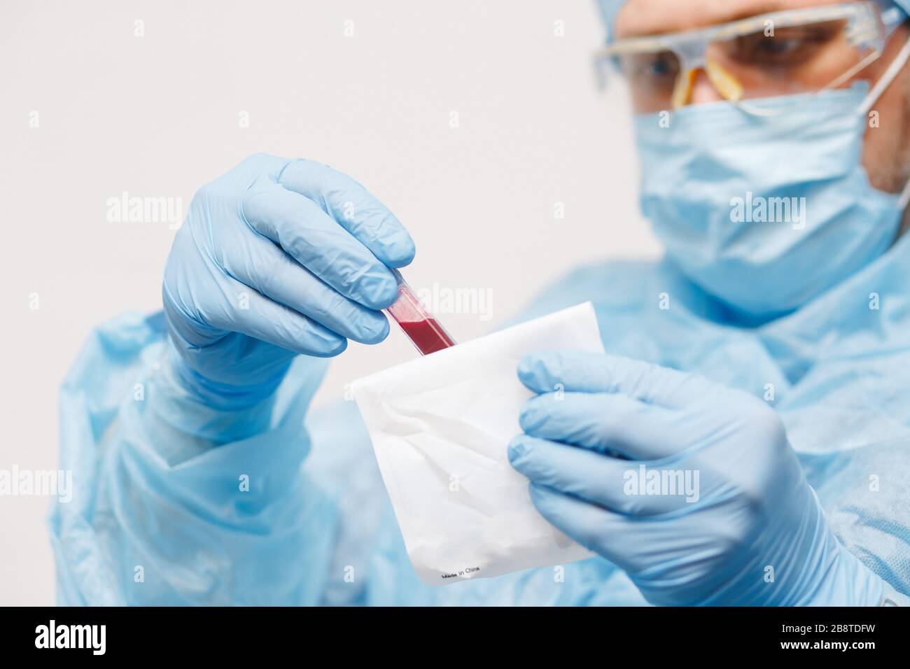 Close up of doctor hand holding blood sample. Medical equipment. Blood ...