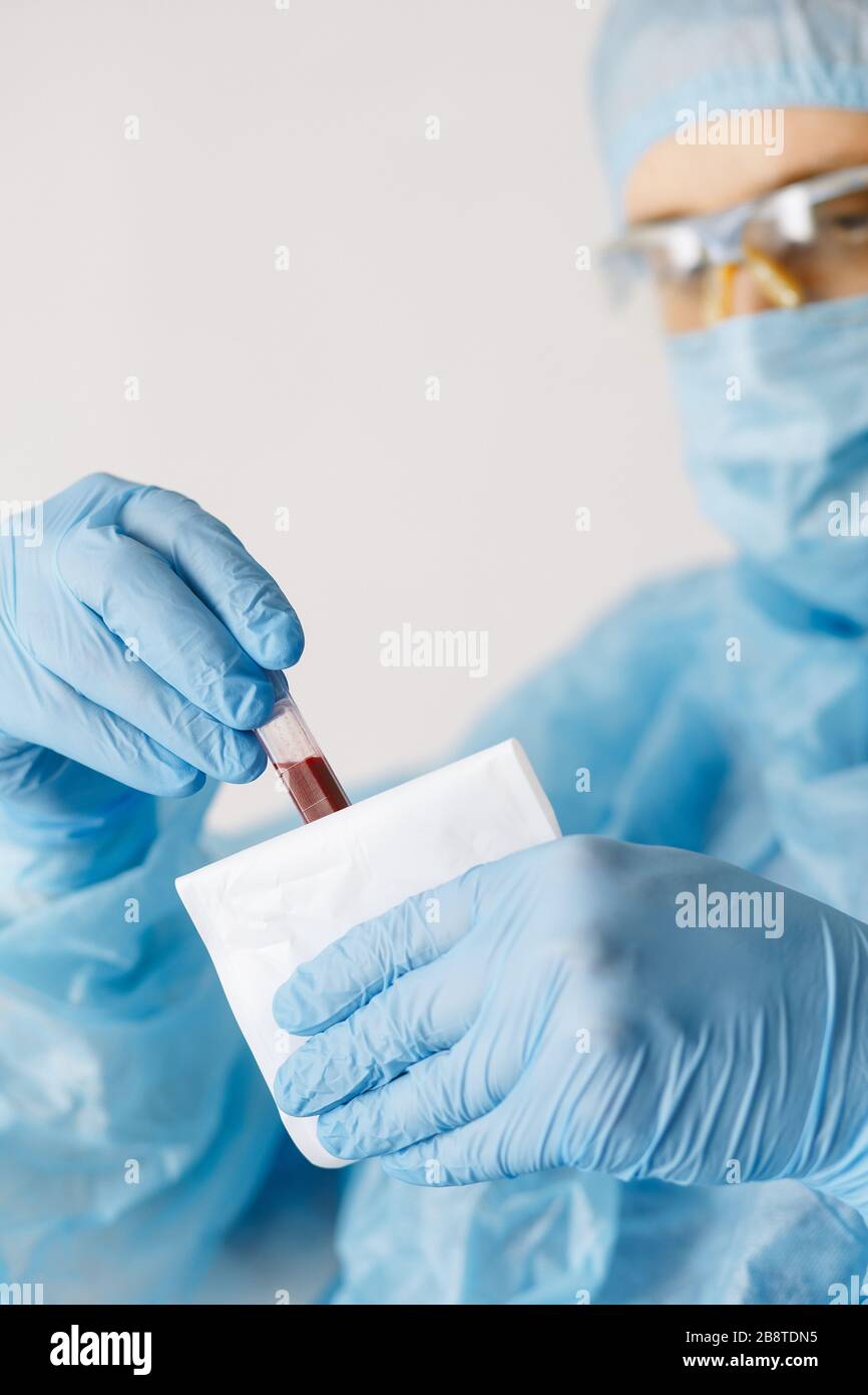 Close up of doctor hand holding blood sample. Medical equipment. Blood ...