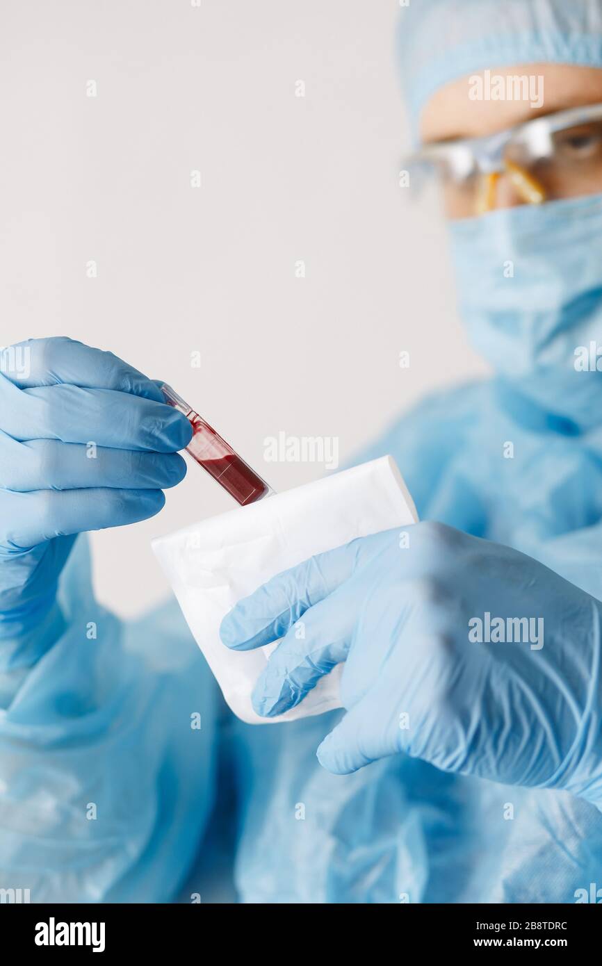 Close up of doctor hand holding blood sample. Medical equipment. Blood ...