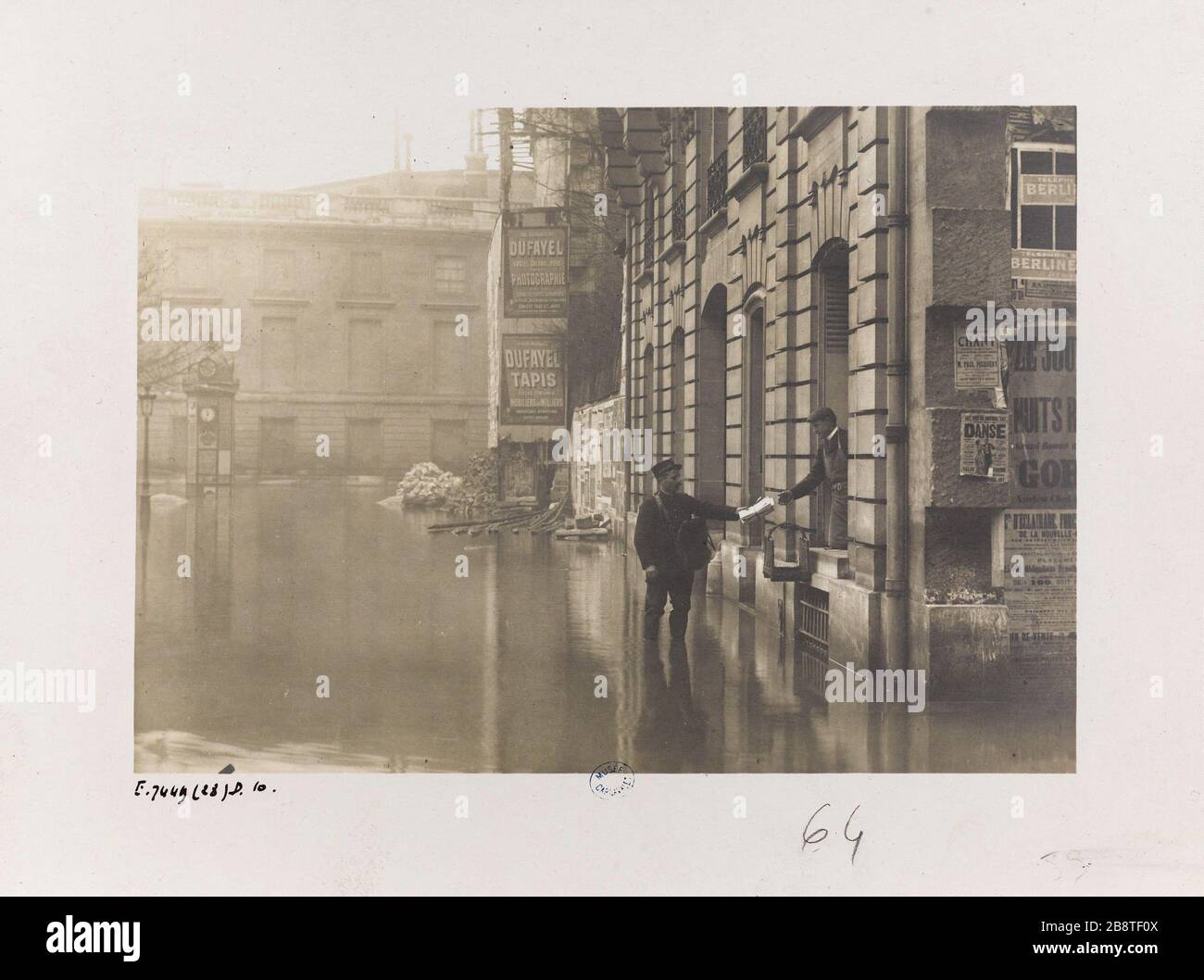 The postman. View of the postman during the flood of the Seine, Paris ...