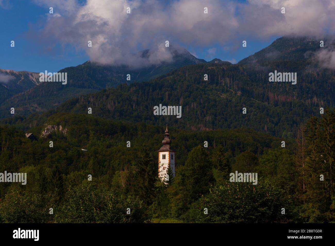 Bell tower of St John the Baptist church in Bohinj, Slovenia Stock ...