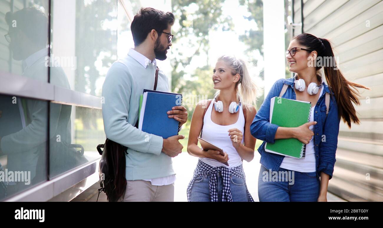 College students studying on university campus outdoor Stock Photo - Alamy