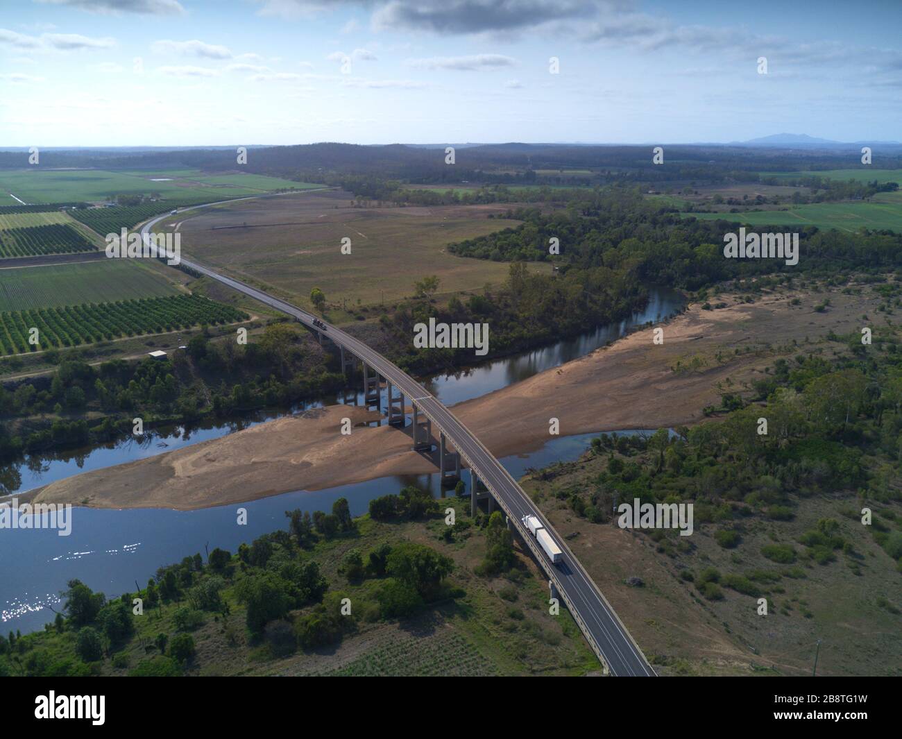 Aerial of truck and trailer crossing the Tim Fischer Bridge Bridge over ...