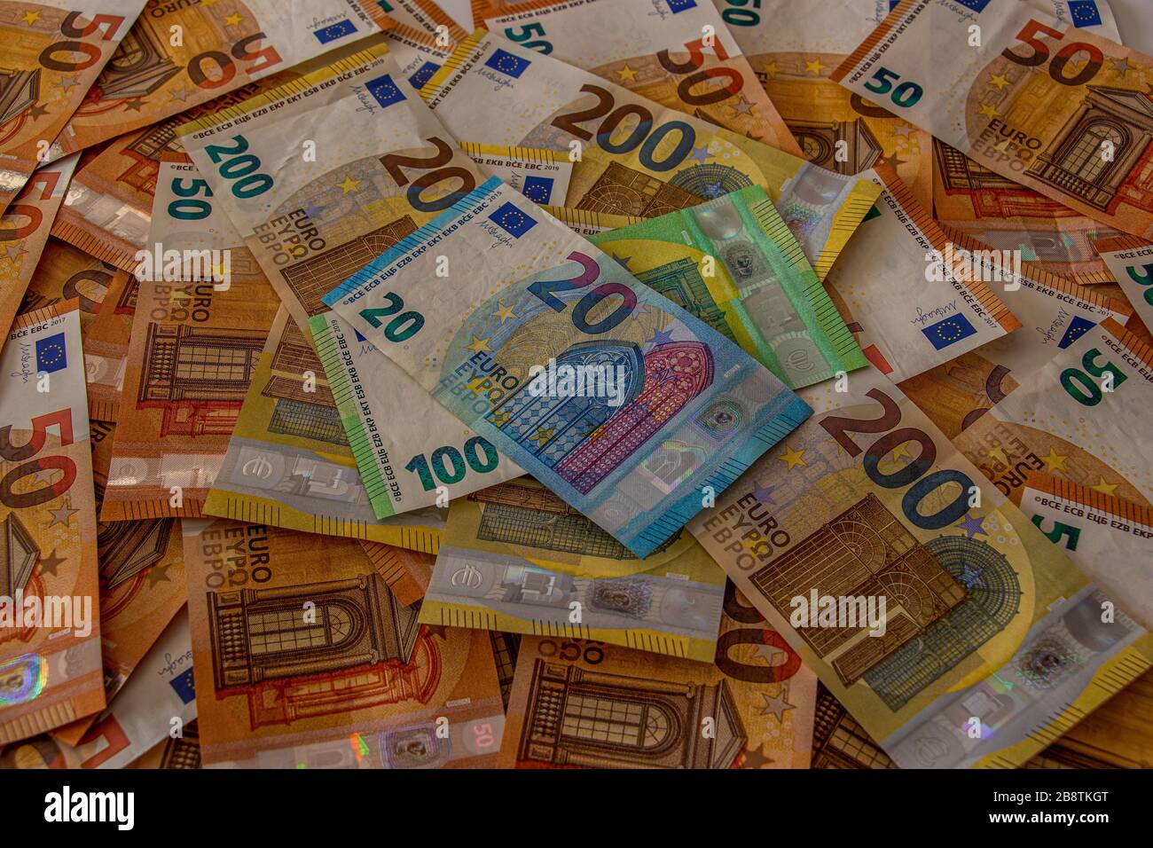 20, 100, 200 euro notes with 50 notes in background Stock Photo - Alamy